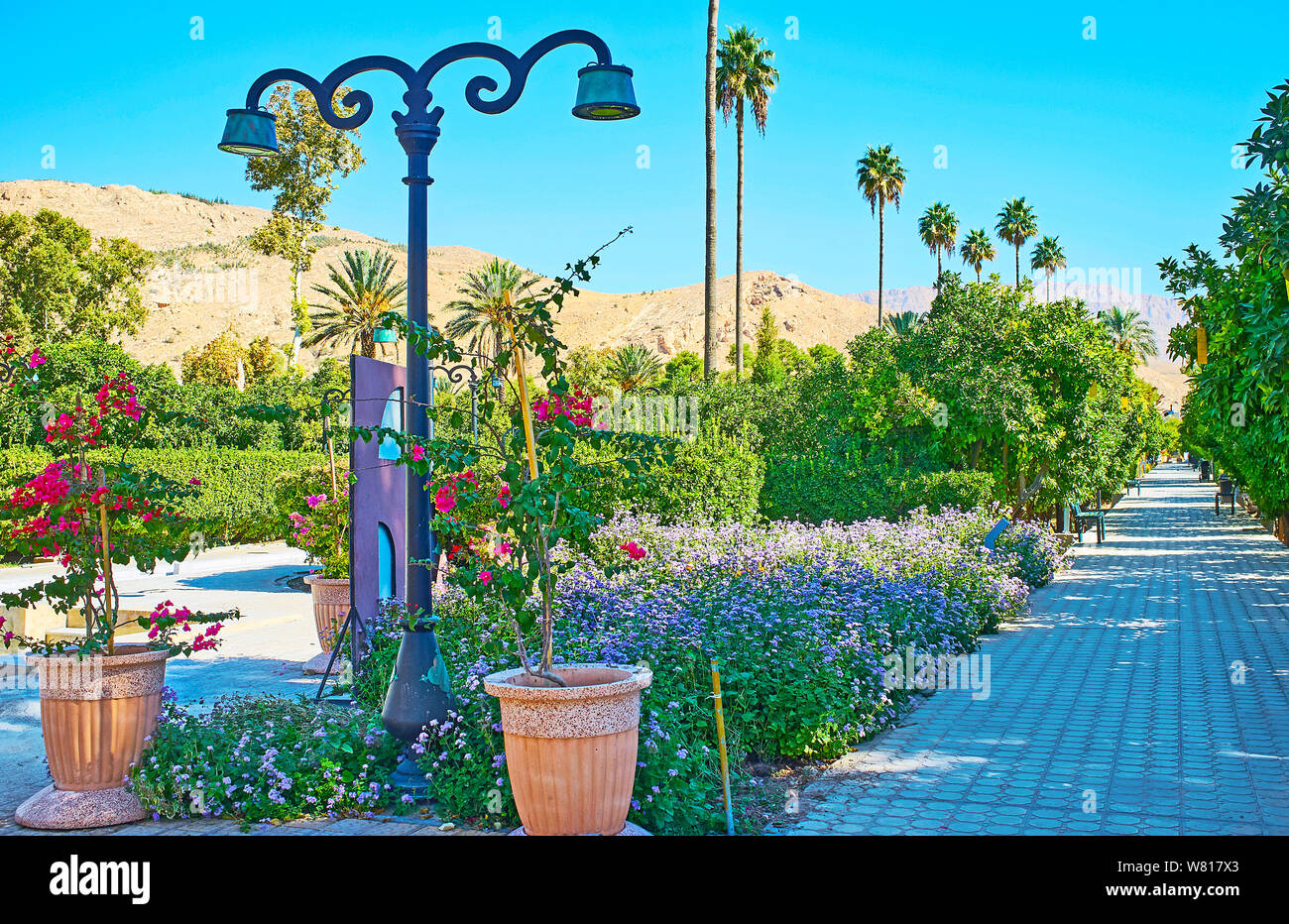 The shady alley runs through the paradisiacal Delgosha Garden - the ...