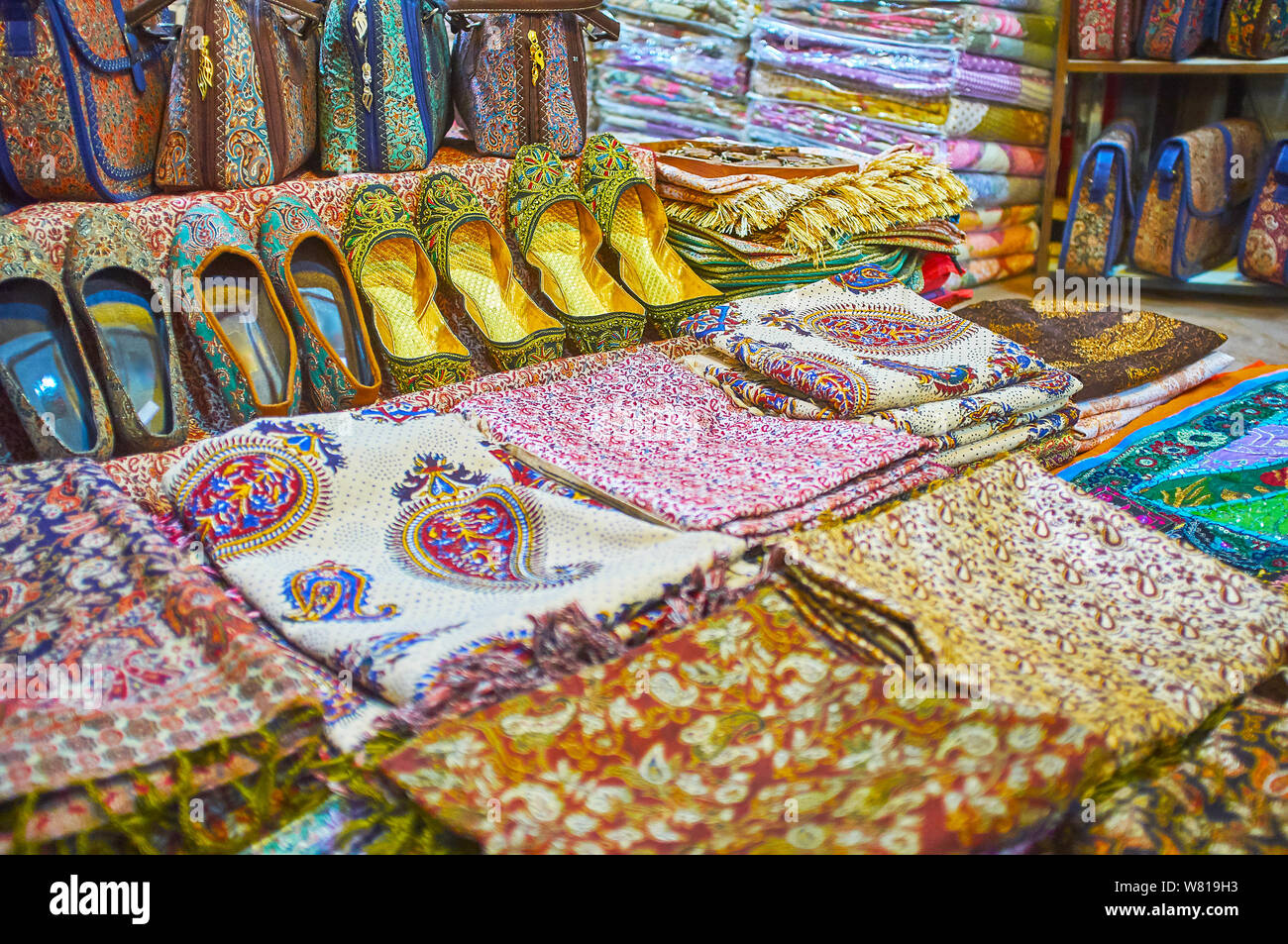 The wide range of traditional textile bags, slippers and scarfs ...