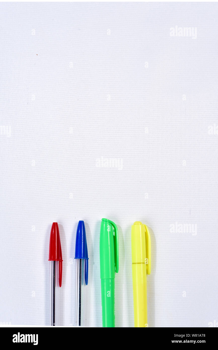 colorful ballpoint pens on white background Stock Photo - Alamy
