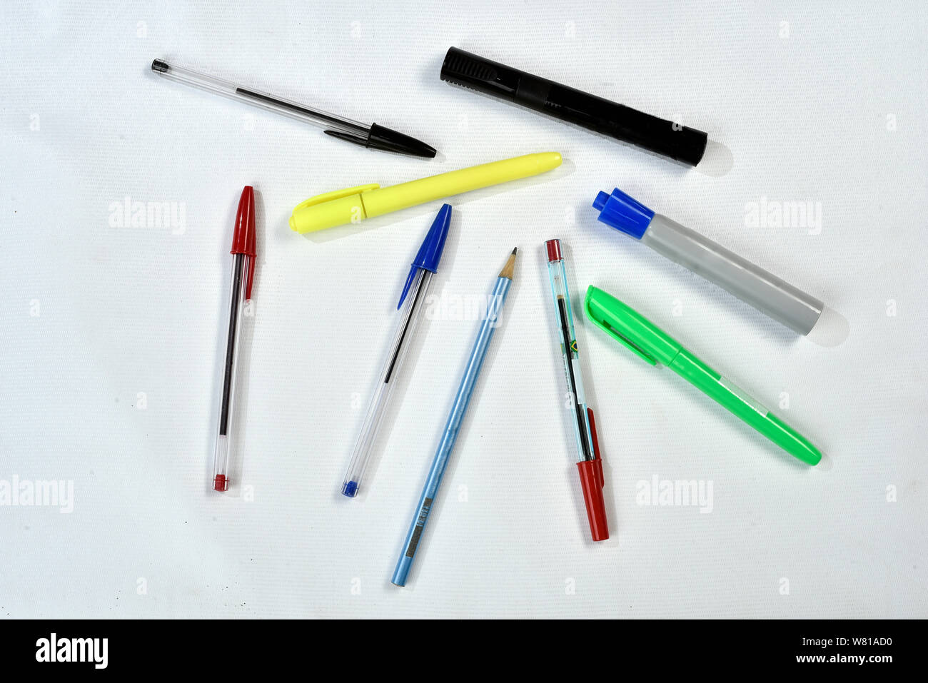 colorful ballpoint pens on white background Stock Photo - Alamy