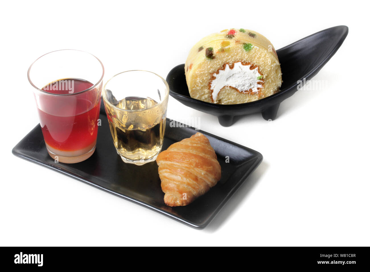 Thai Traditional milk tea served with tea, croissant and roll fruit ...