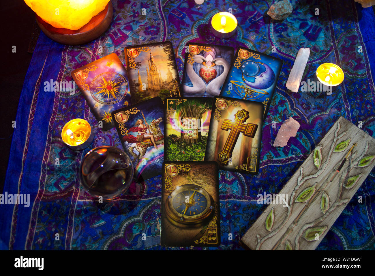 Tarot cards at candle light Stock Photo - Alamy