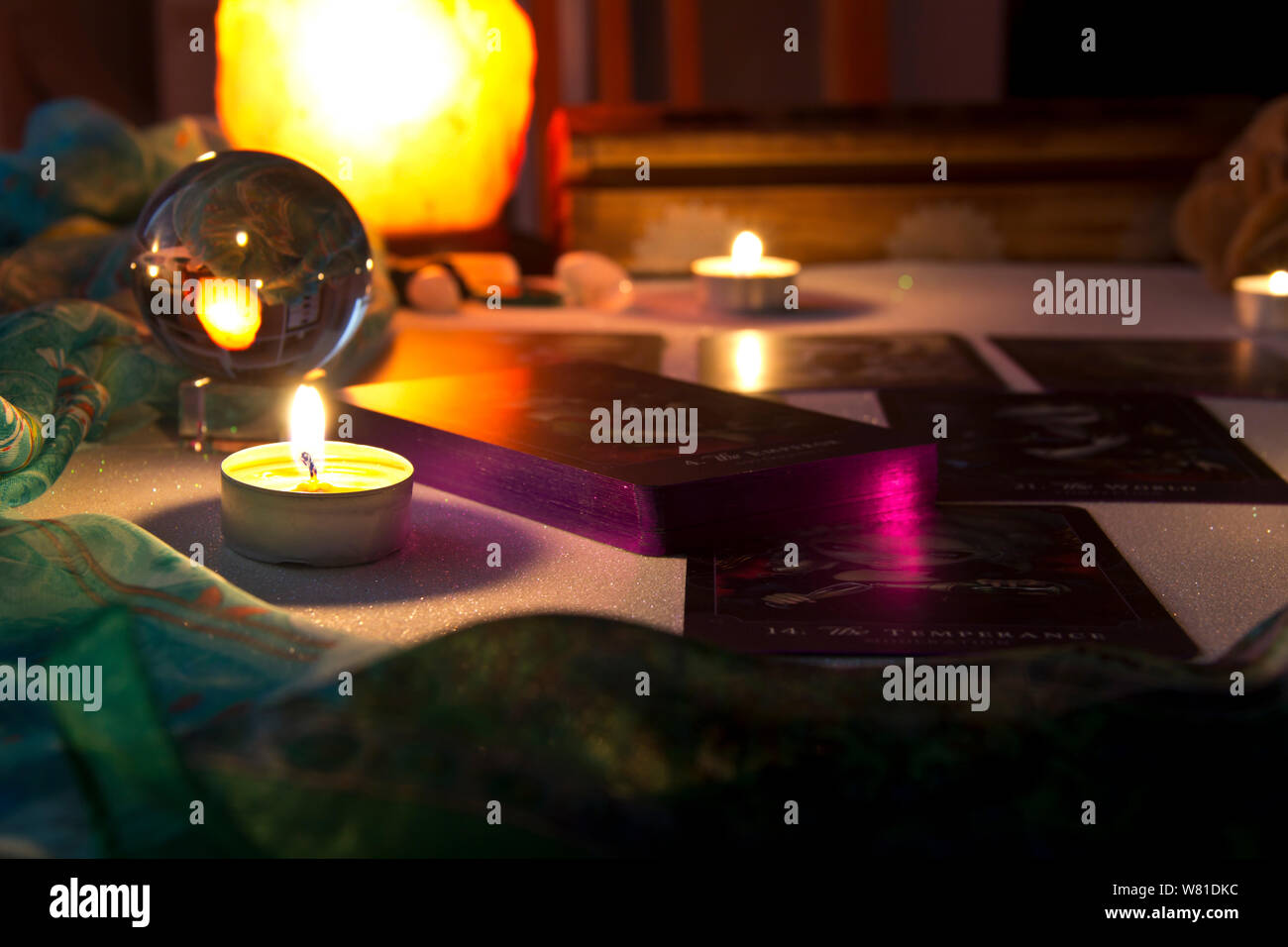 Tarot cards at candle light Stock Photo - Alamy