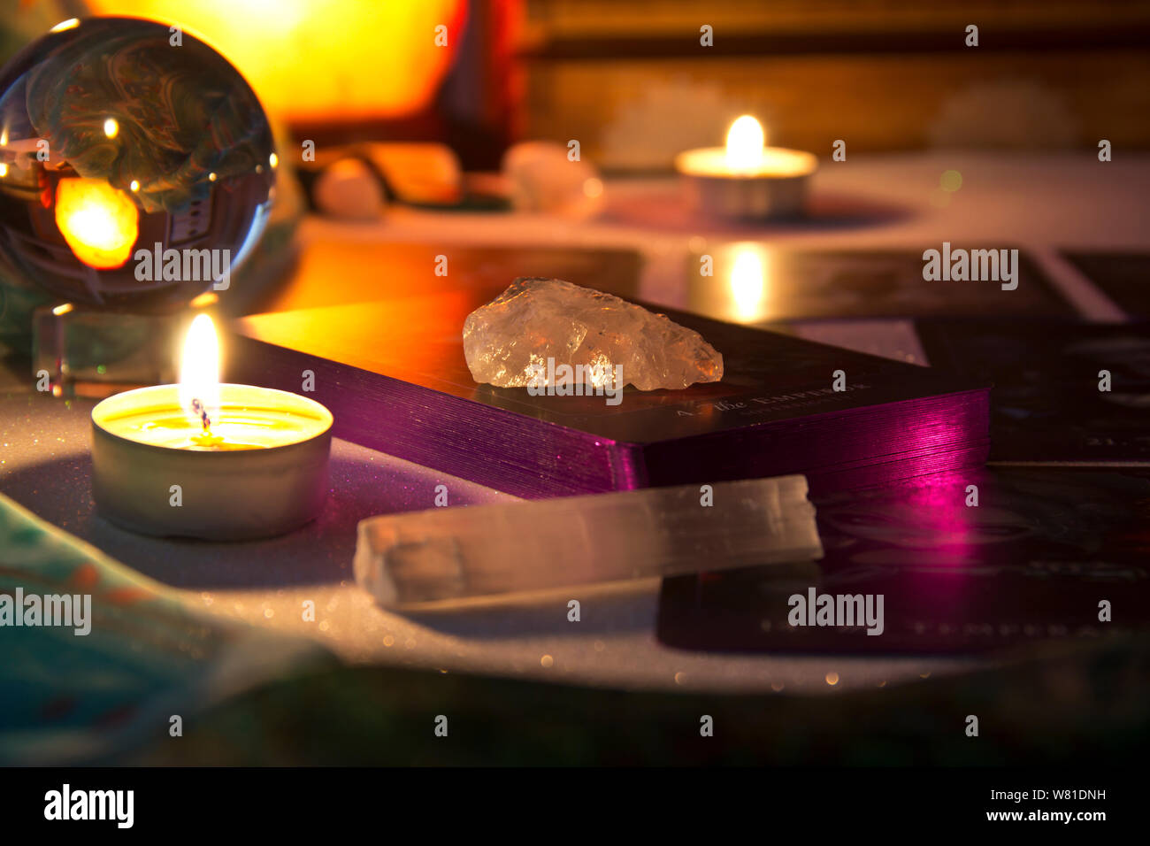 Tarot cards at candle light Stock Photo - Alamy