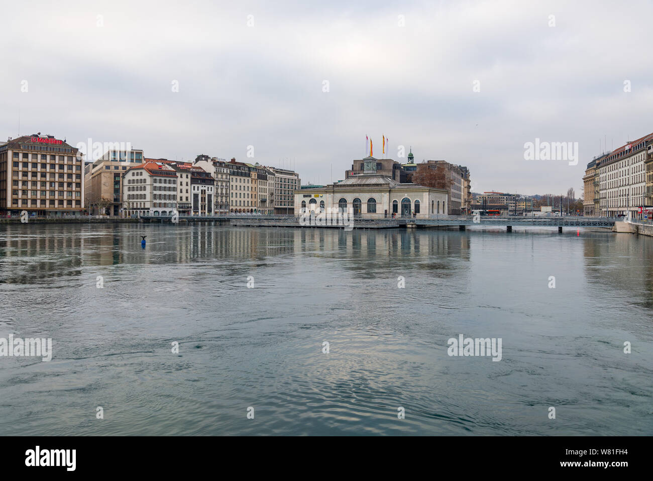 City view of waterside and pedestrian bridge cross Lake Geneva and ...