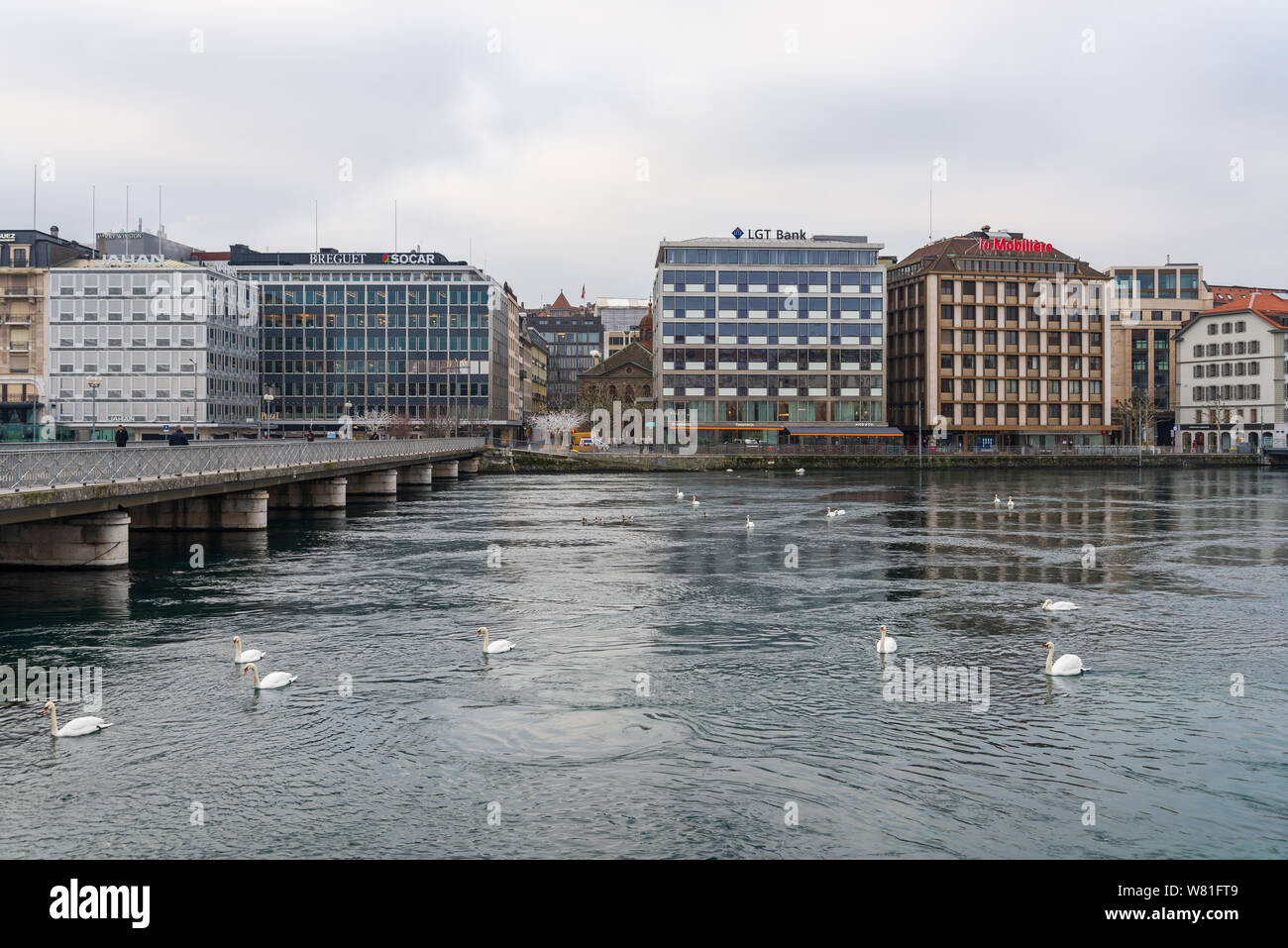 Waterside and pedestrian bridge, Pont des Bergues, cross Lake Geneva ...