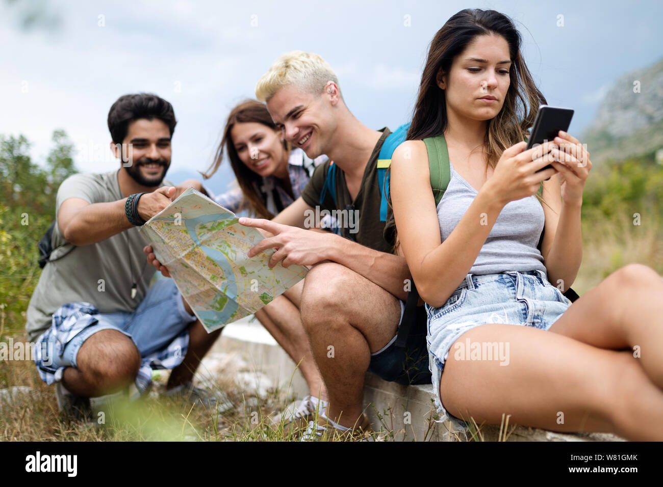 Adventure, travel, tourism and people concept - group of smiling ...