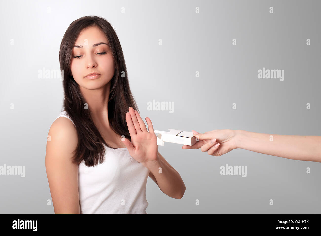 Healthy Young Woman Refusing To Take Cigarette From Pack. Portrait Of ...