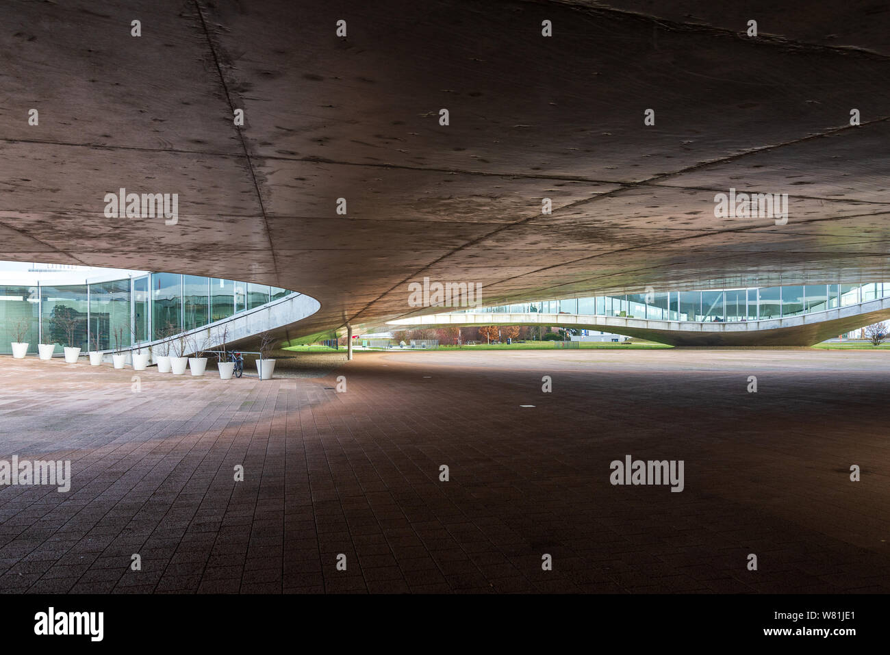 Exterior ground floor of Rolex Learning Center (EPFL) with fascinate ...
