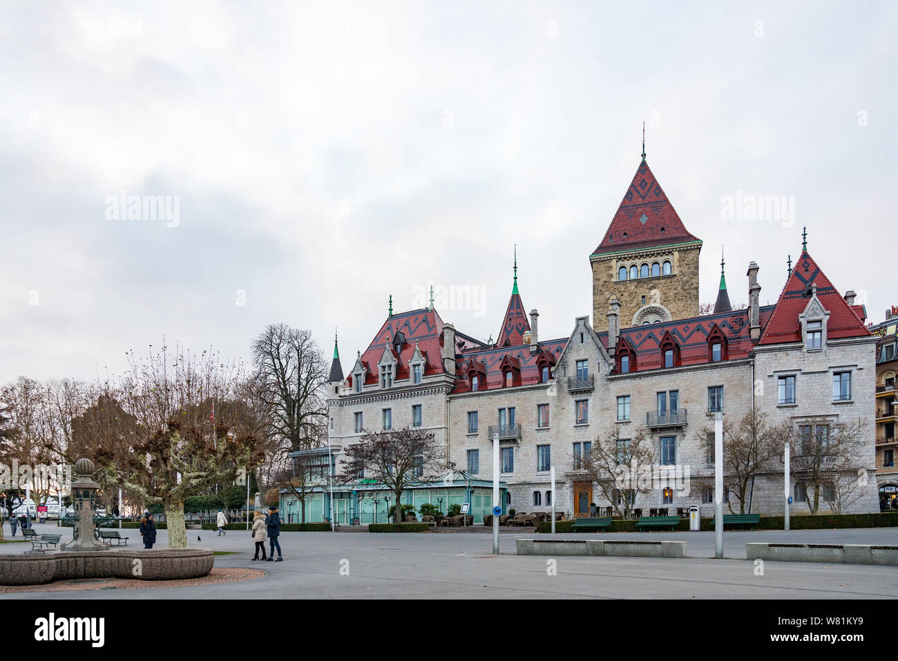 Outdoor scenery of promenade waterside of lake Geneva and hotel Château ...