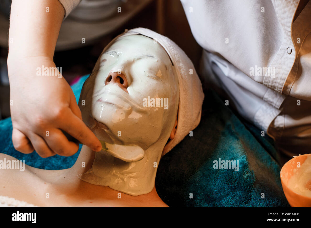 White alginate mask applied woman hi-res stock photography and images ...