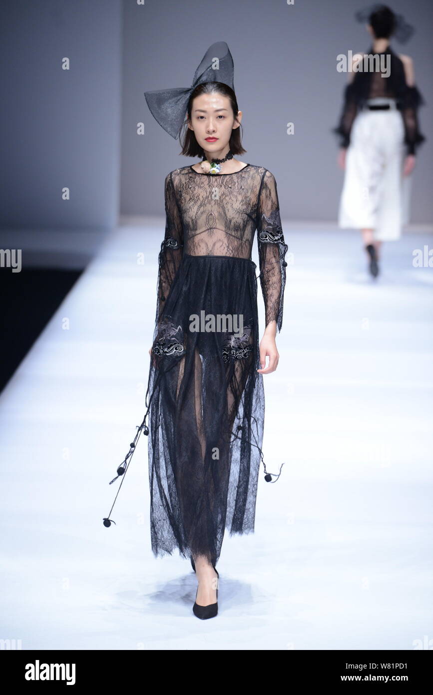 A model displays a new creation at the fashion show of CC by Chinese ...