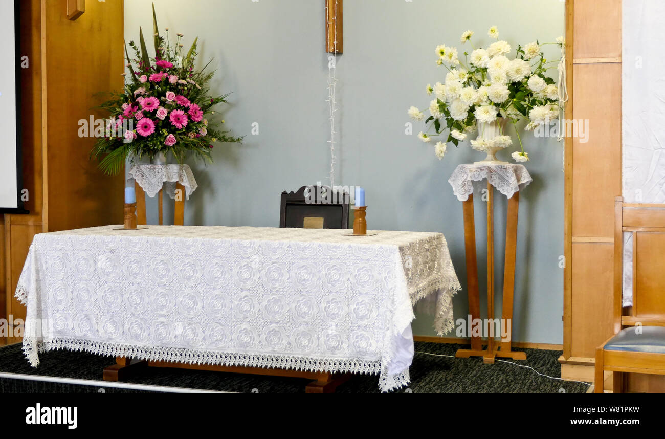 closeup shot of a funeral casket in a hearse or chapel or burial at ...