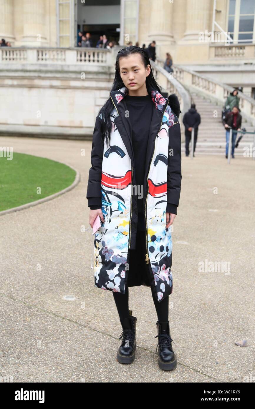 Chinese model Wang Xinyu attends the Moncler Gamme Rouge Fashion Show ...