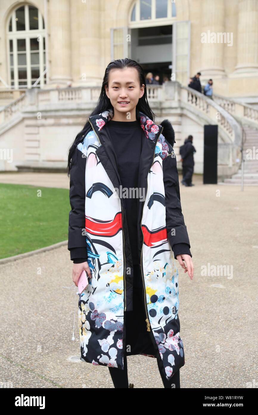 Chinese model Wang Xinyu attends the Moncler Gamme Rouge Fashion Show ...