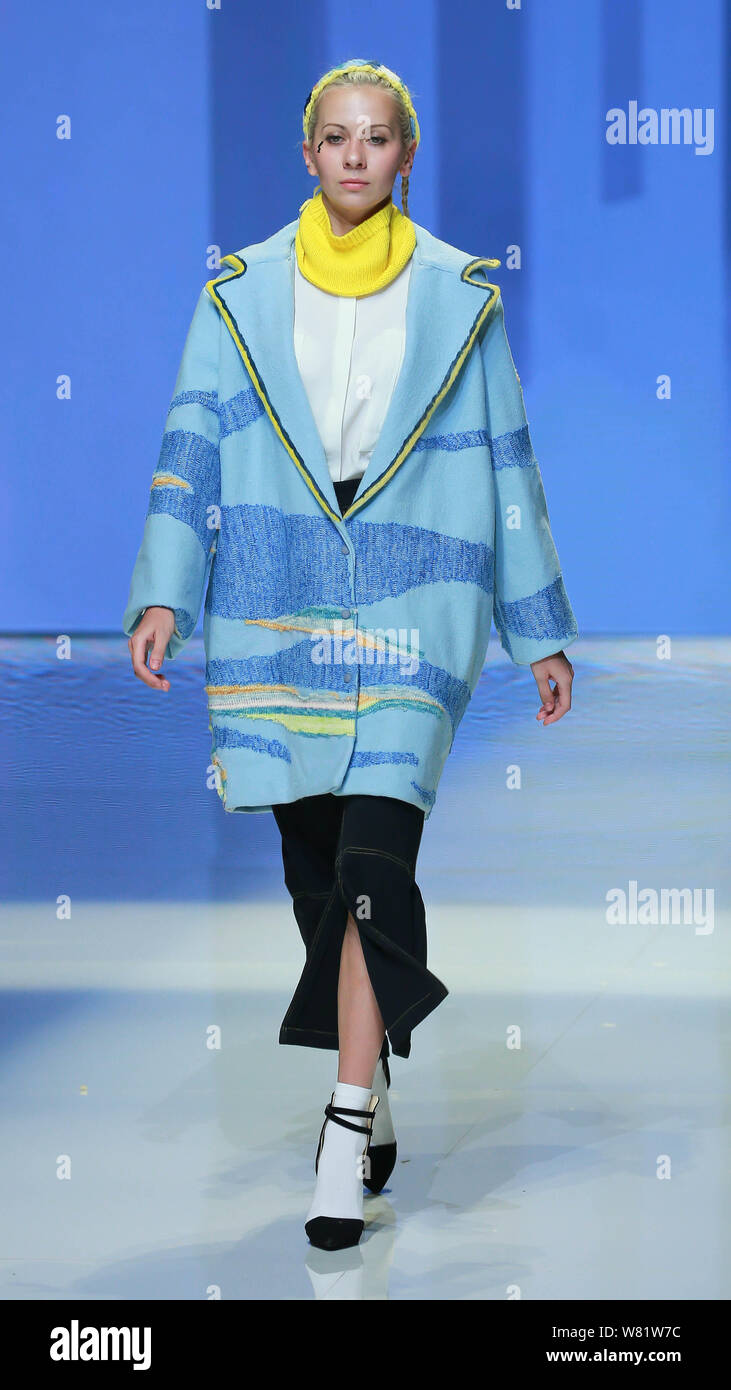 A model displays a creation by a graduate during a fashion show for ...