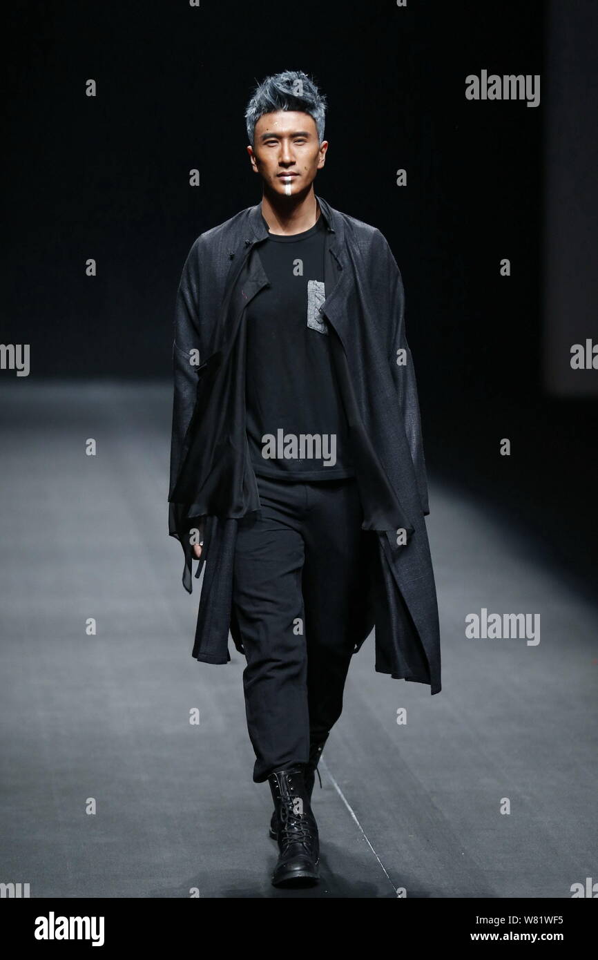 A model displays a new creation at the fashion show of AJ-NAMO during ...