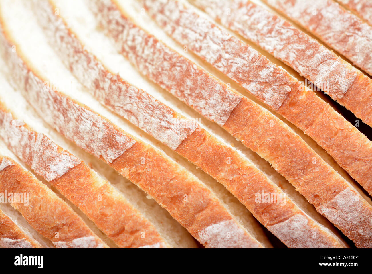 Sliced bread arranged for background uses Stock Photo - Alamy