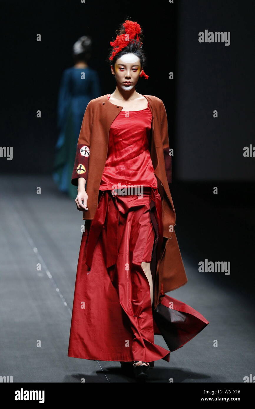 A model displays a new creation at the fashion show of AJ-NAMO during ...