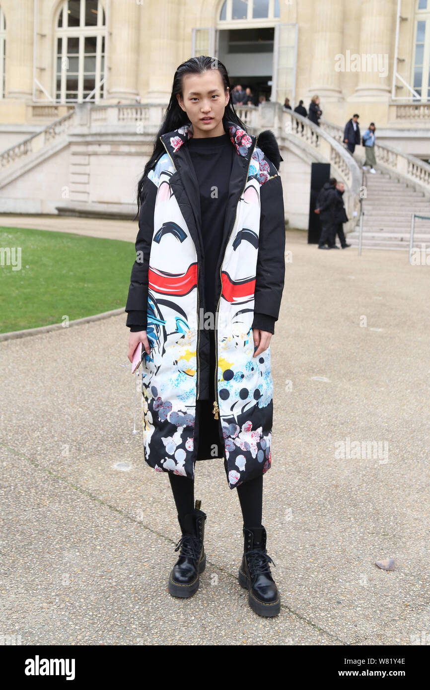 Chinese model Wang Xinyu attends the Moncler Gamme Rouge Fashion Show ...
