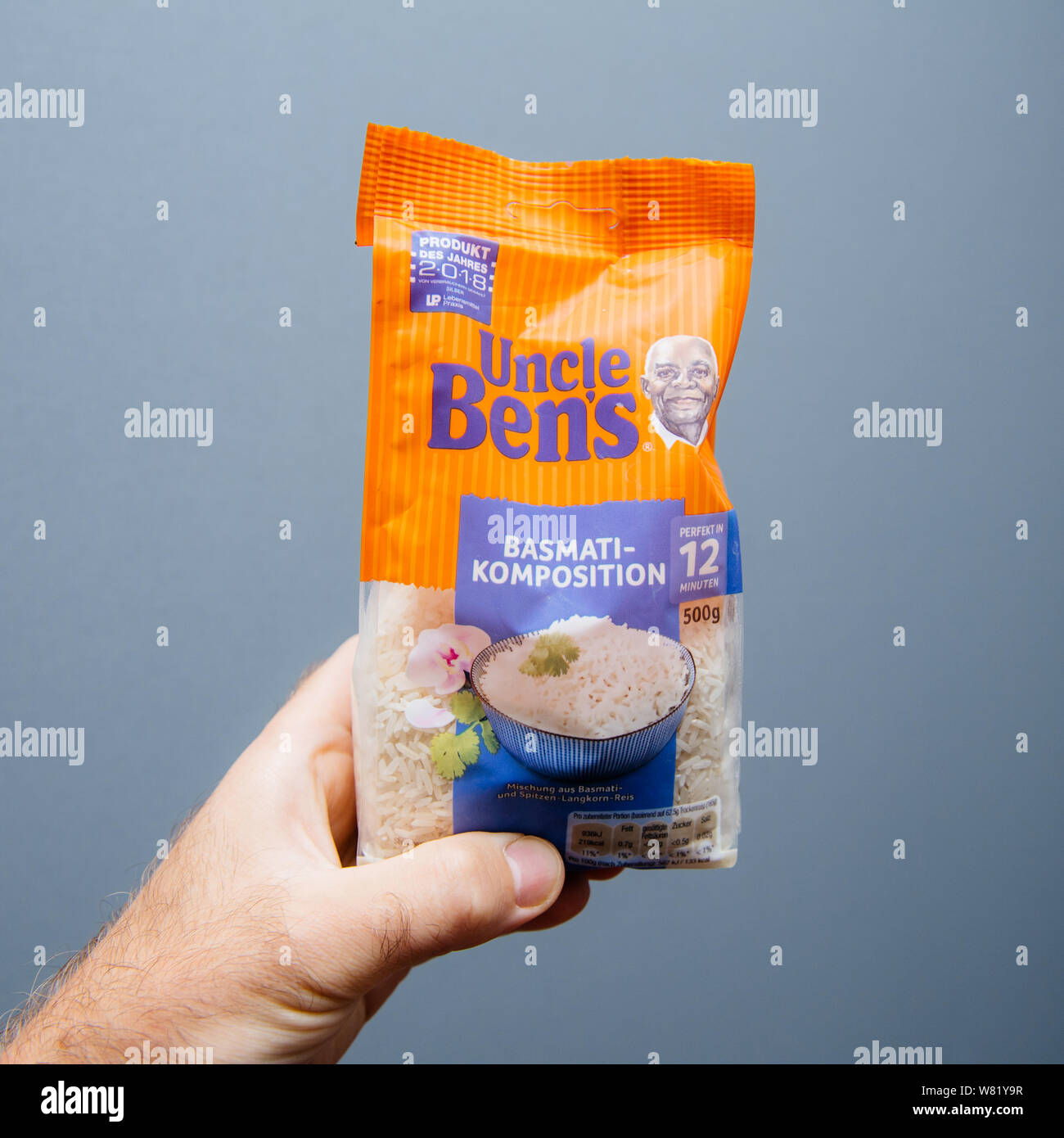 Paris, France - Aug 8, 2018: Man hand holding Uncle Ben's basmati rice ...