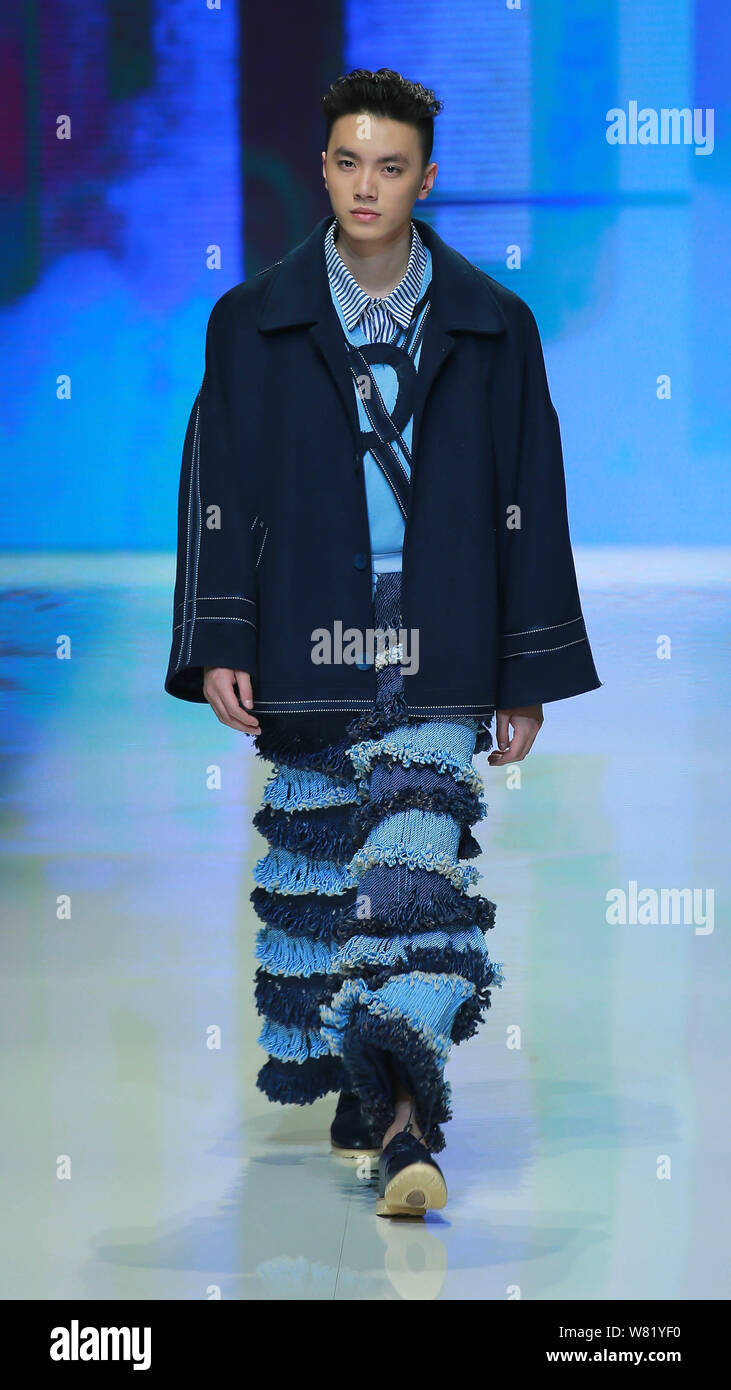 A model displays a creation by a graduate at a fashion show for ...