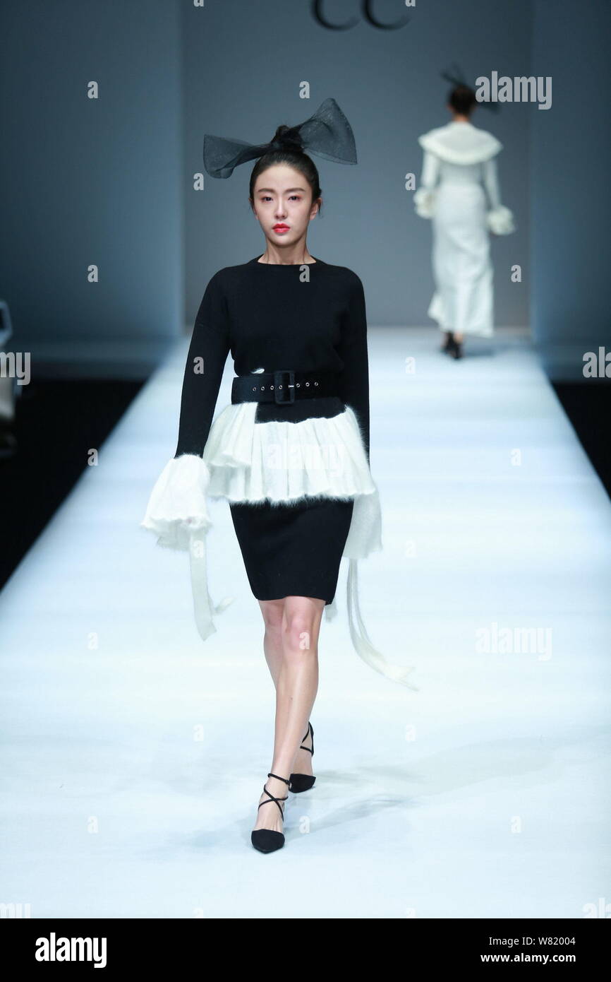 A model displays a new creation at the fashion show of CC by Chinese ...