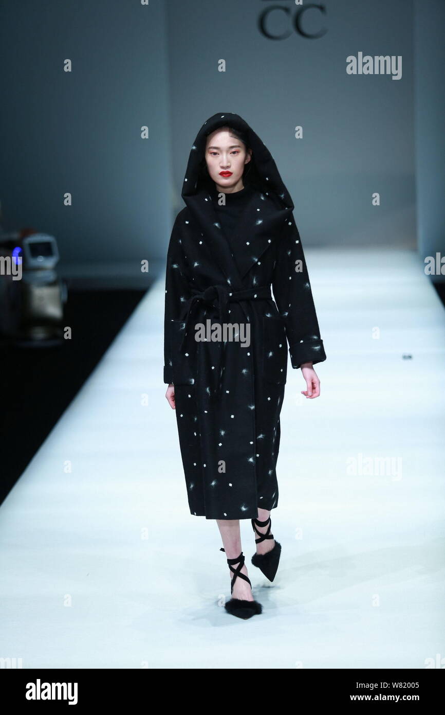 A model displays a new creation at the fashion show of CC by Chinese ...
