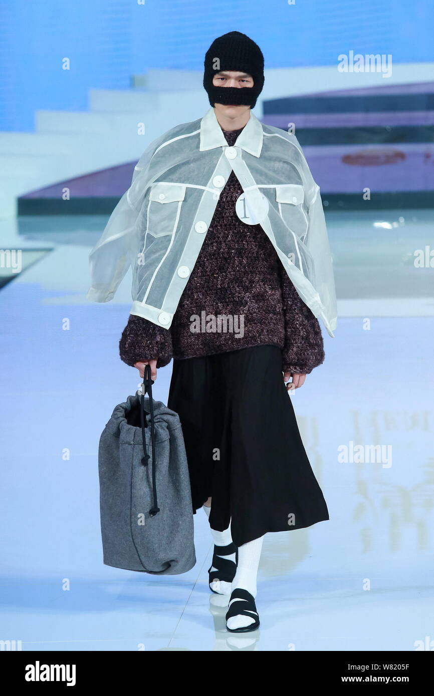 A model displays a new creation at Hempel Award - The 25th China ...