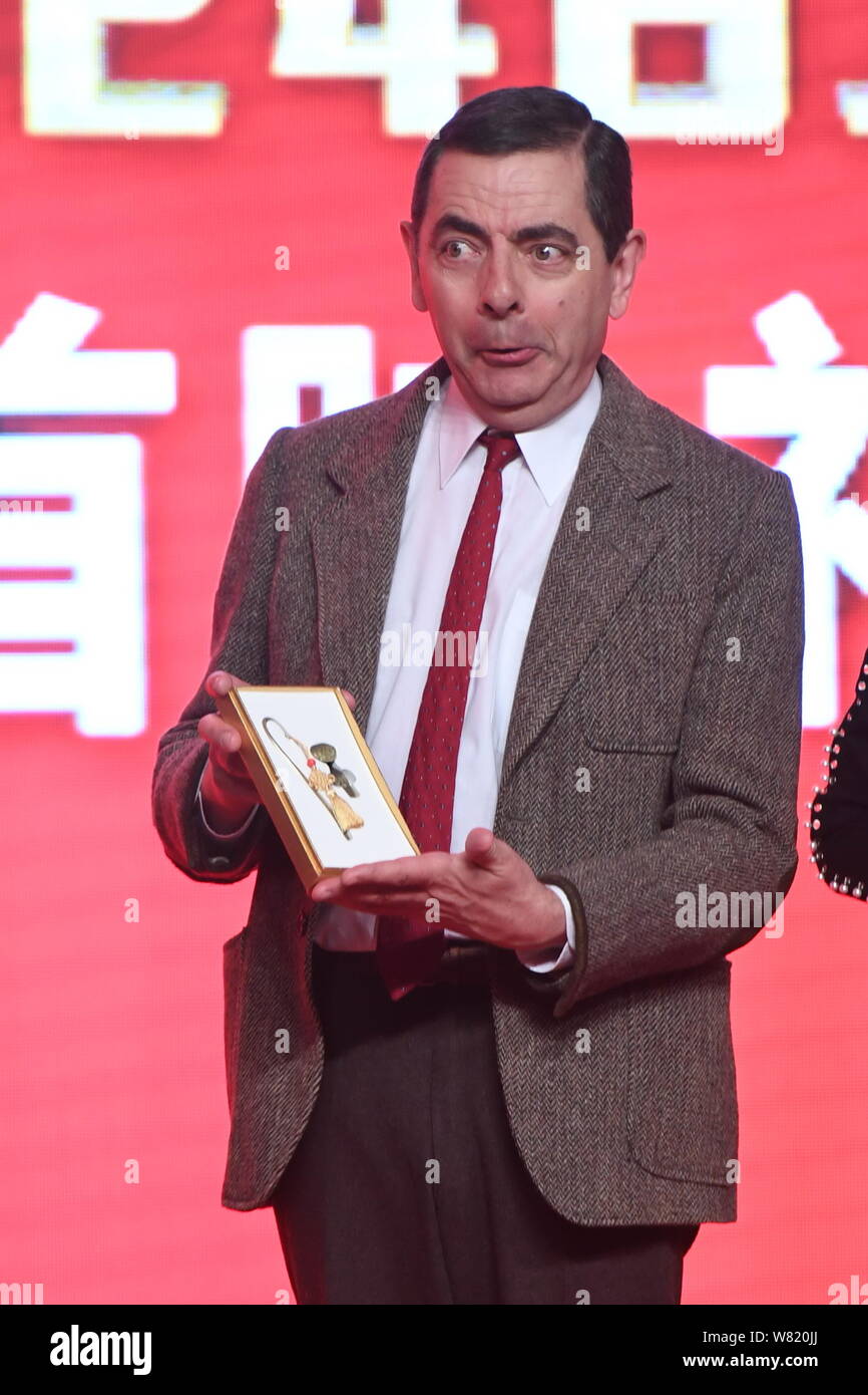 English actor Rowan Atkinson plays Mr. Bean during a premiere for his ...
