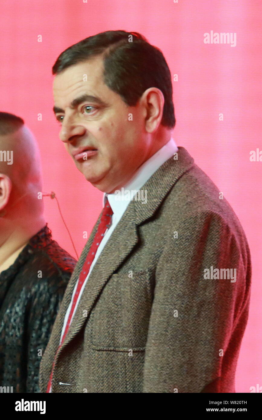 English actor Rowan Atkinson plays Mr. Bean during a premiere for his ...