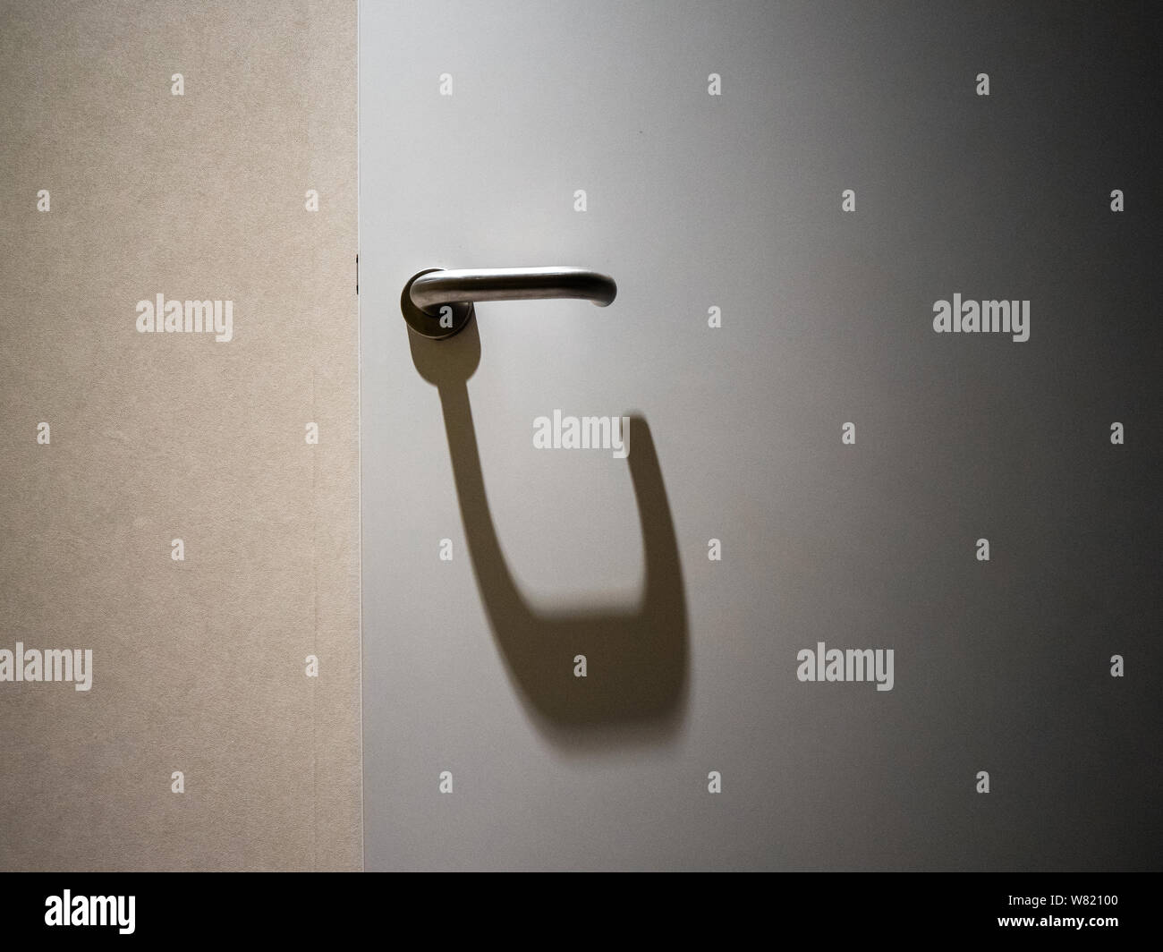 Metallic door handle with wireless RFID key opeper in modern hotel ...