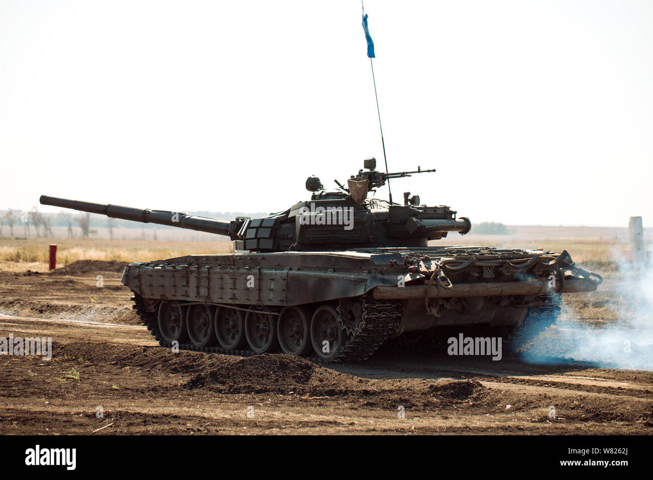 Armored Tank rides on off-road. Tank exercises in the countryside Stock ...
