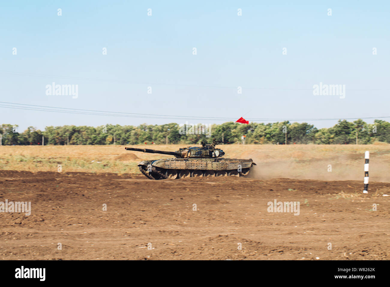 Armored Tank rides on off-road. Tank exercises in the countryside Stock ...