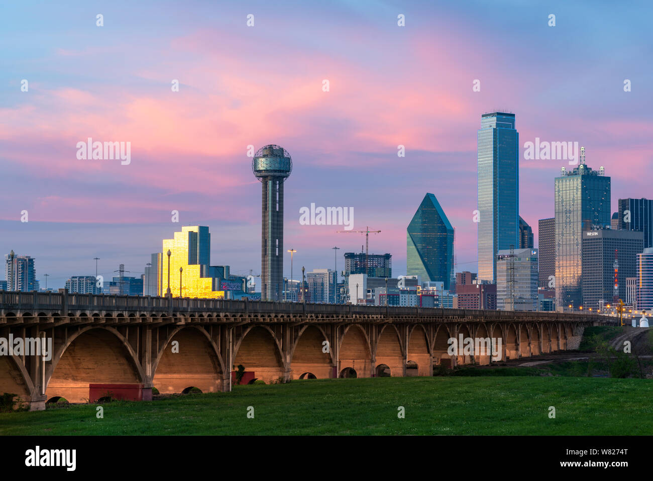 Beautiful sunset view of the North Houston Street Bridge leading ...