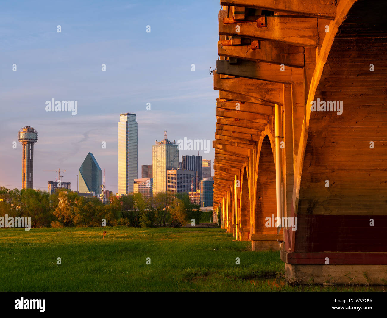 View of the Dallas skyline during sunset near a bridge in the Trinity River Park Stock Photo - Alamy