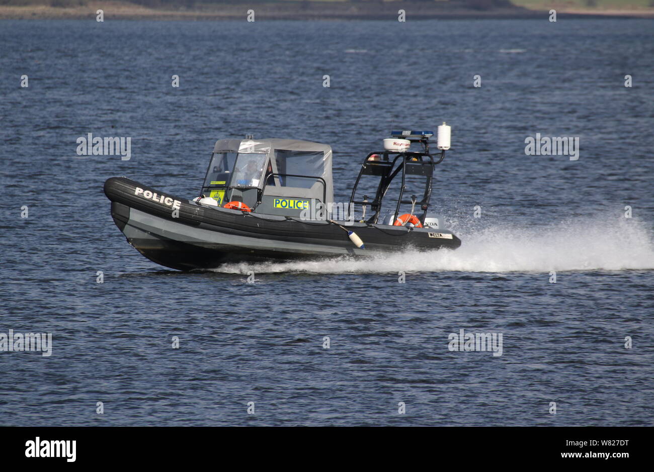 A Delta Marine RHIB operated by Police Scotland, passes Greenock's East ...