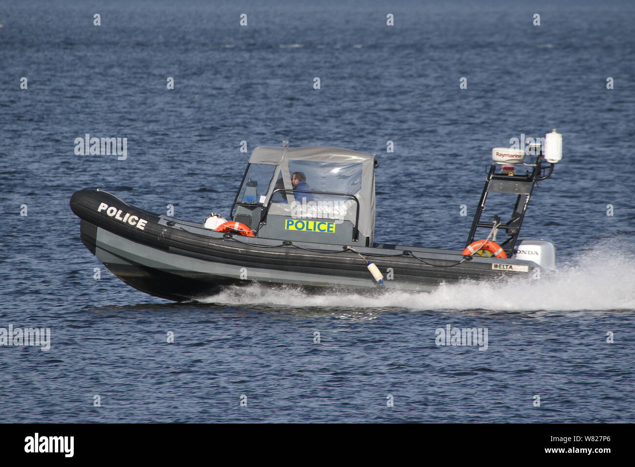 A Delta Marine RHIB operated by Police Scotland, passes Greenock's East ...