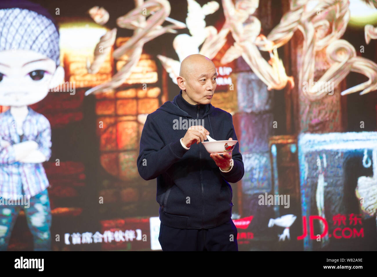 Chinese actor Ge You eats tangyuan or glutinous rice balls at a press ...