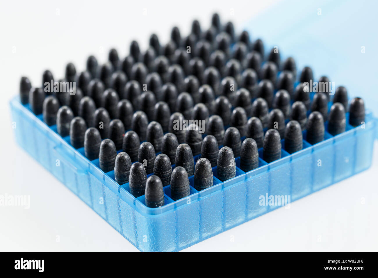 Hunting cartridges in a plastic box. Bullet storage box Stock Photo - Alamy