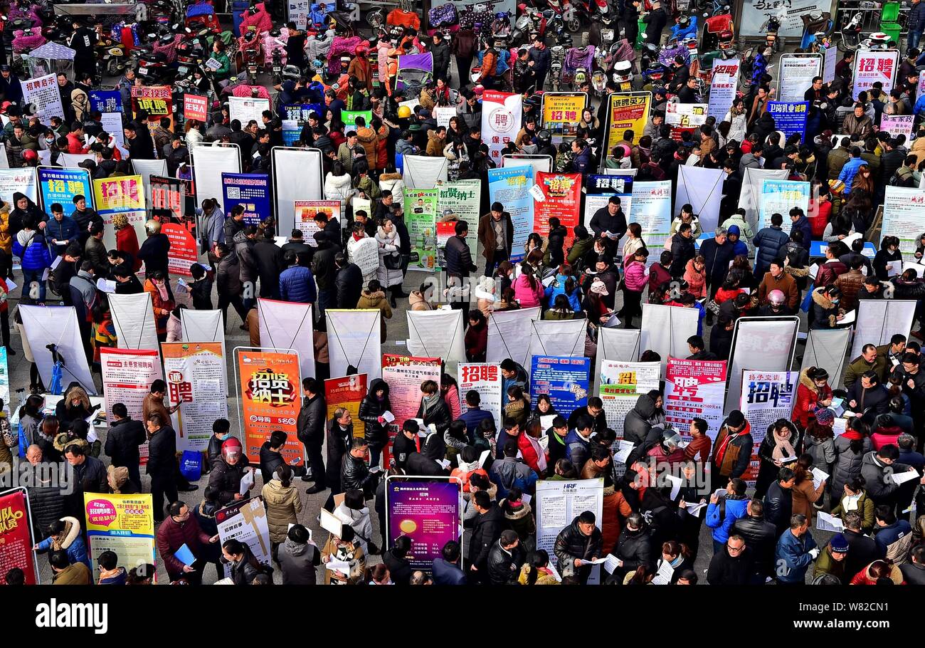 Chinese job seekers crowd a job fair in Chuzhou city, east China's ...