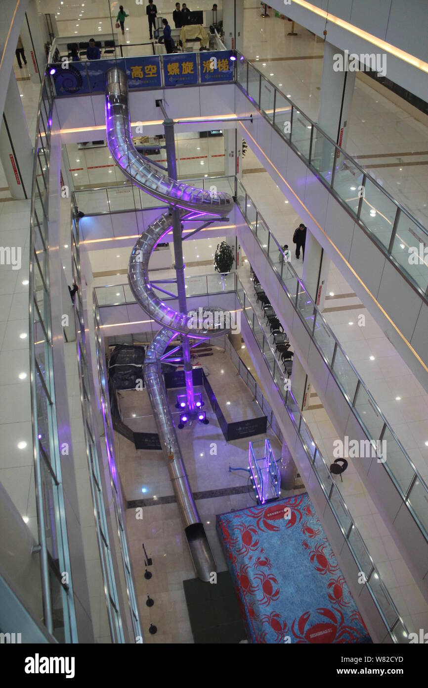 Areial view of the 16-meter tall super slide at a shopping mall in ...