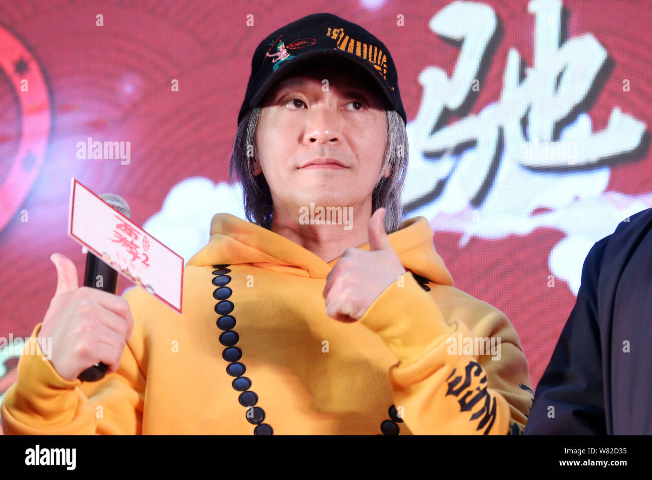 --FILE--Hong Kong actor and director Stephen Chow poses at a press ...