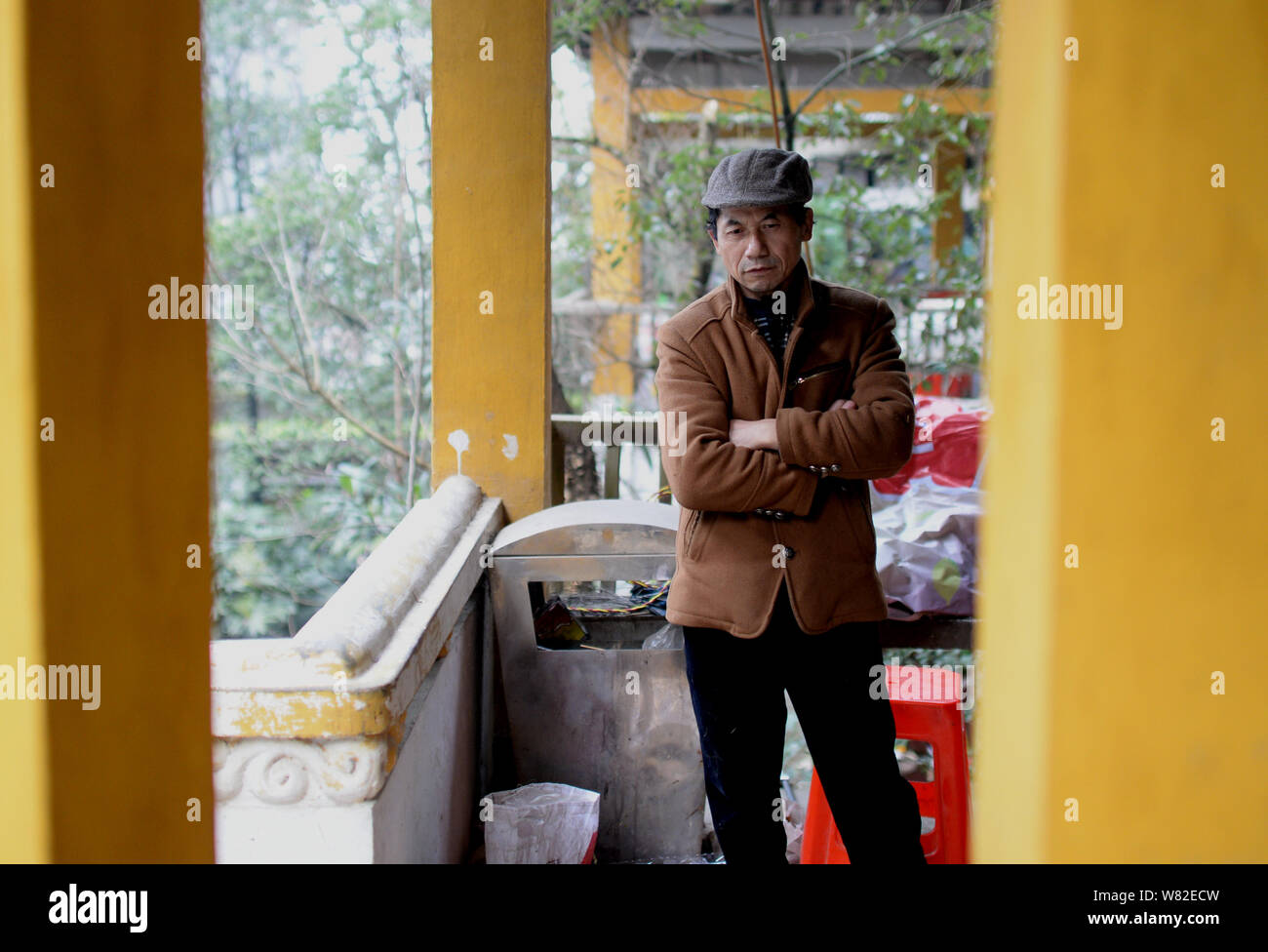 Chinese zoo owner and keeper Tan Decai is pictured at the one-man zoo ...