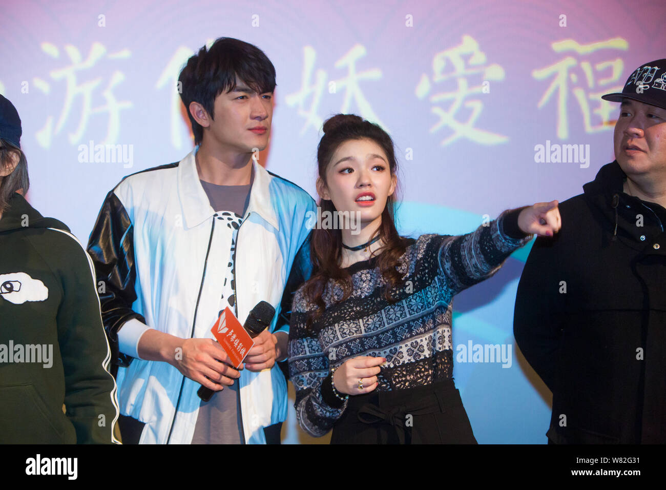 Chinese actress Jelly Lin or Lin Yun, center, and actor Kenny Lin or ...