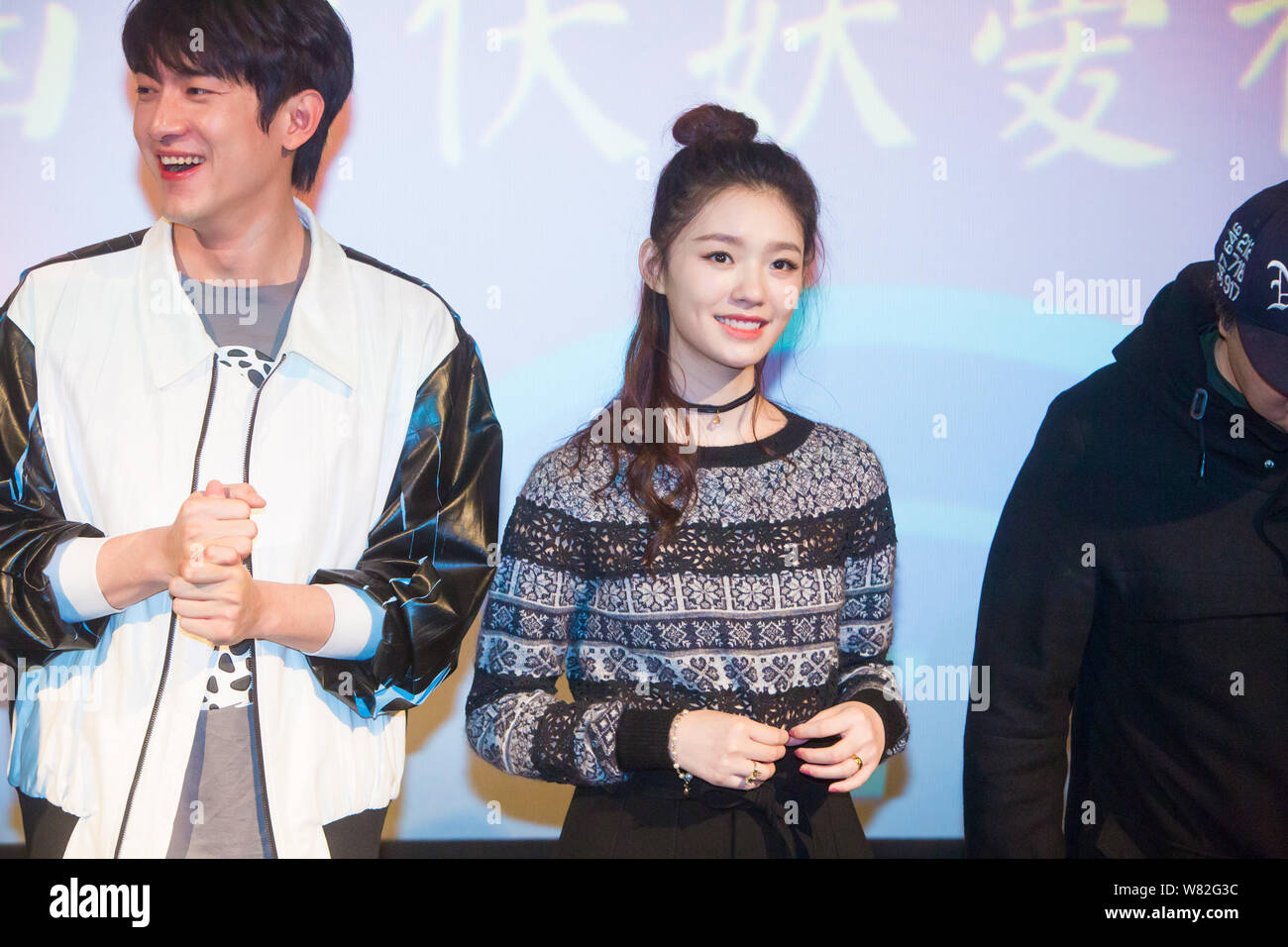 Chinese actress Jelly Lin or Lin Yun, center, and actor Kenny Lin or ...
