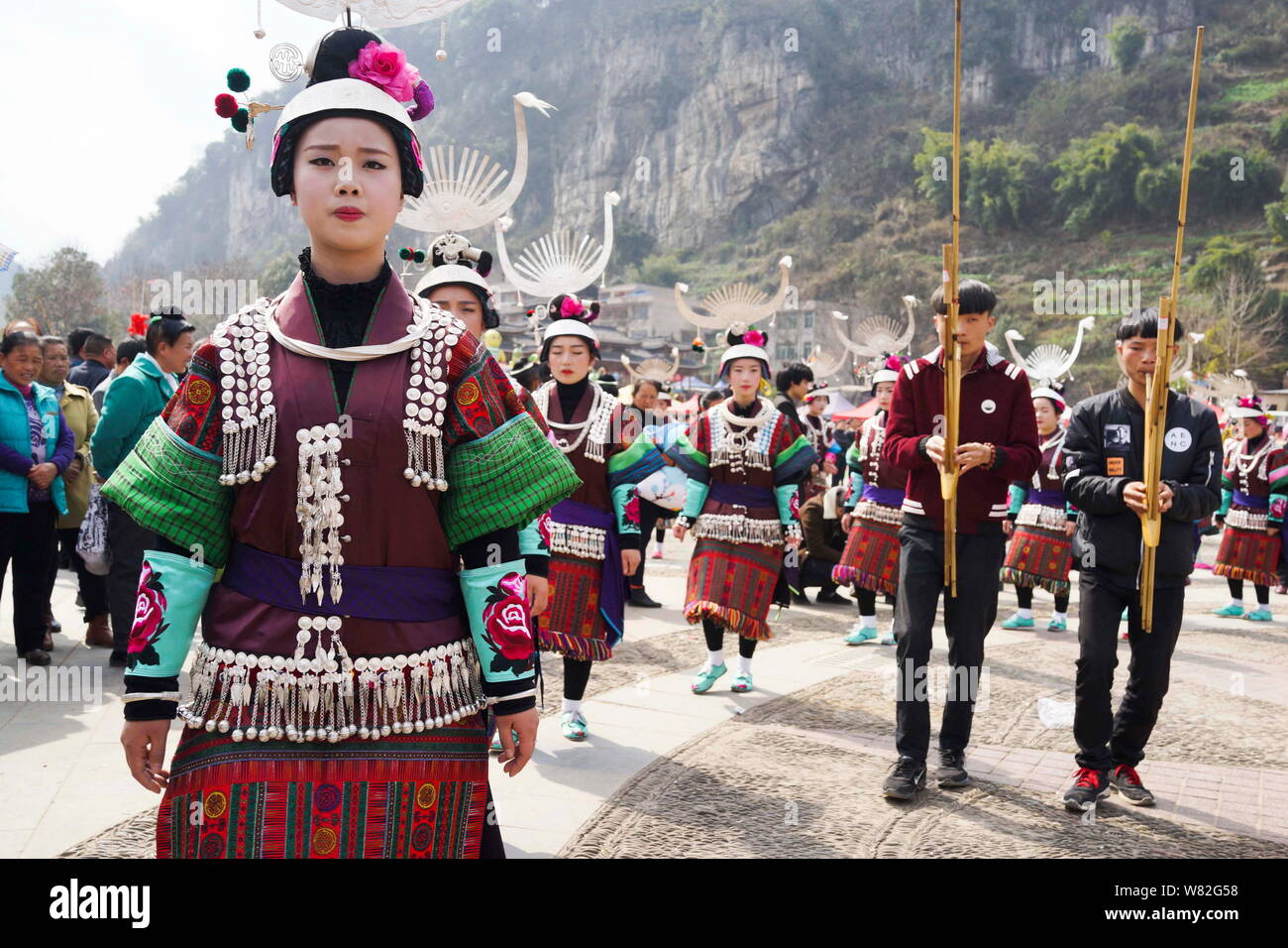 Chinese women of Miao ethnic minority dressed in traditional silver ...
