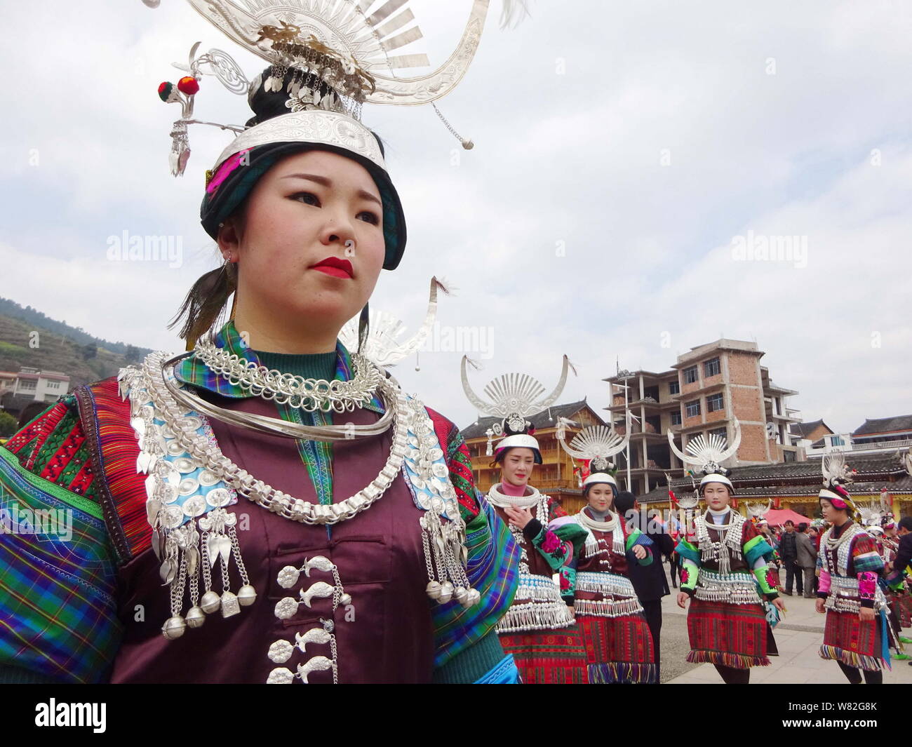 Chinese women of Miao ethnic minority dressed in traditional silver ...