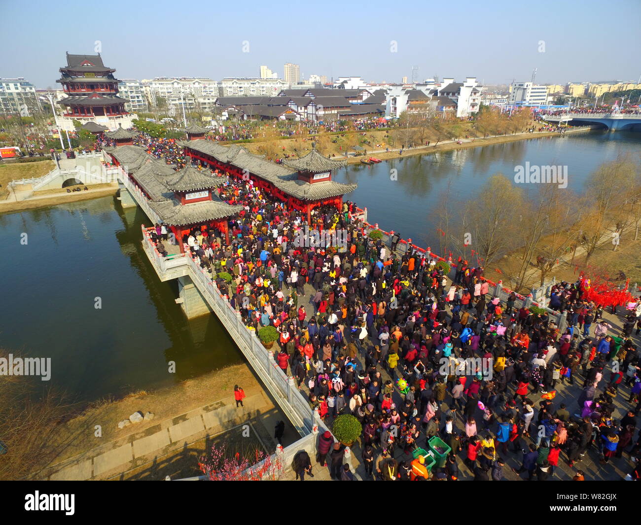 Aerial view of Chinese worshippers crowding the Taiping Bridge to pray ...