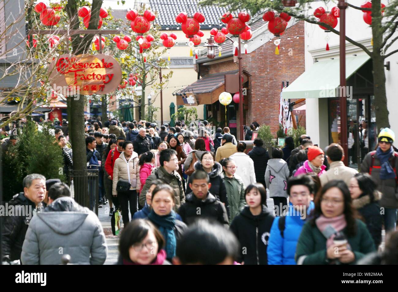 --FILE--Tourists crowd the Shanghai Disneyland to celebrate its first ...